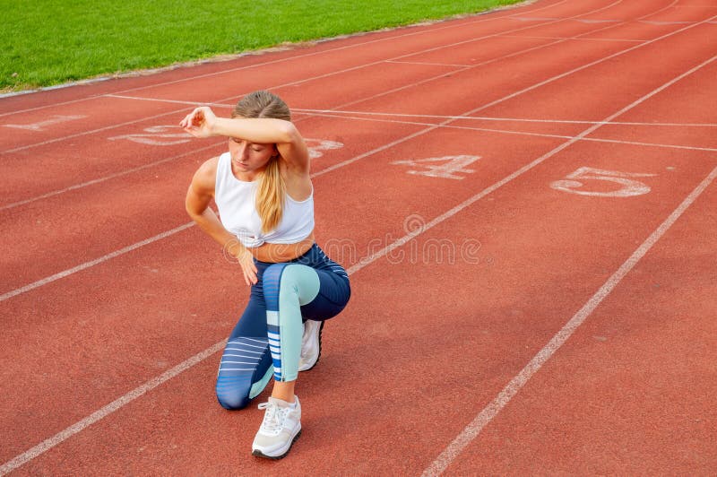 Tired Woman Runner Taking a Rest after Run Sitting on the Running Stock ...