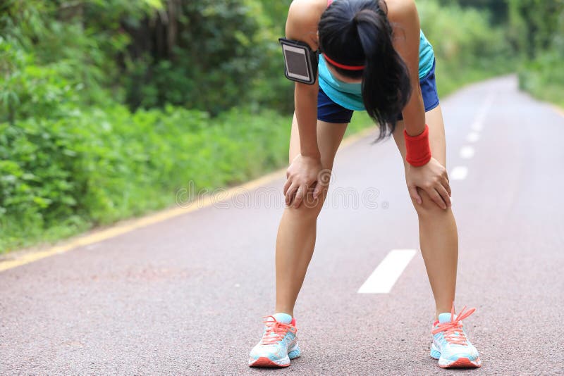 Tired Woman Runner Taking a Rest after Running Hard Stock Photo - Image ...