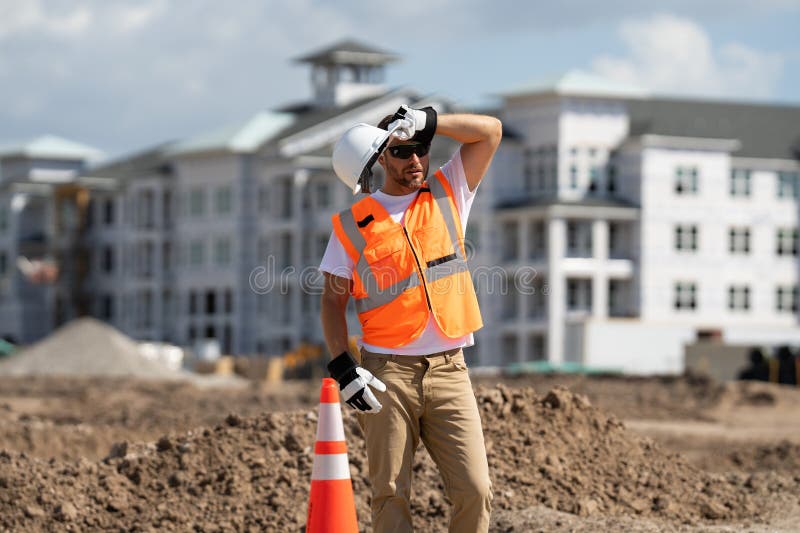 Tired Worker. Builder in a Hard Hat Working on a Construction Project ...