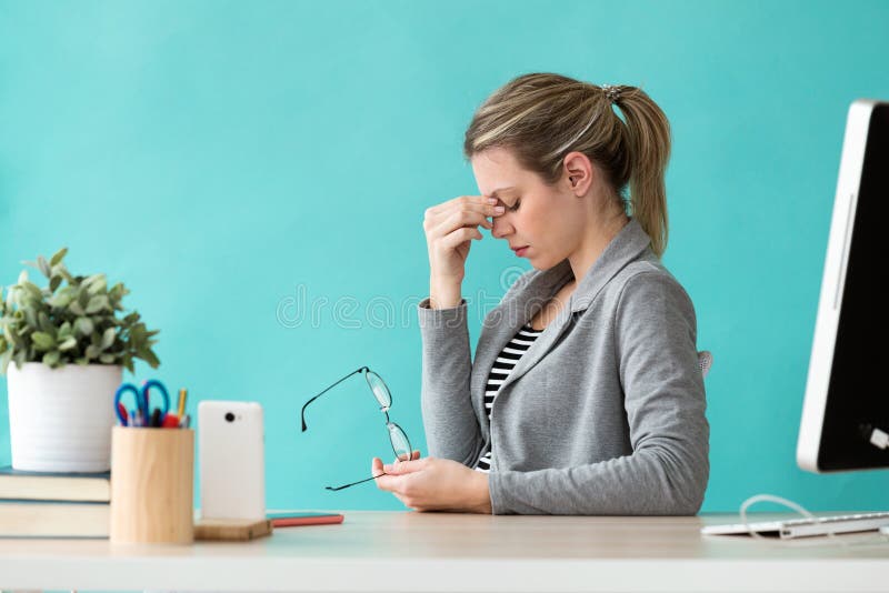 Tired Young Business Woman Having Headache while Working with Computer ...