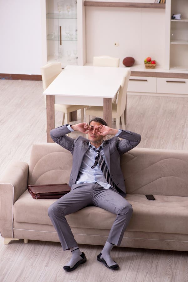 Tired Young Businessman Coming Home after Working Day Stock Photo ...