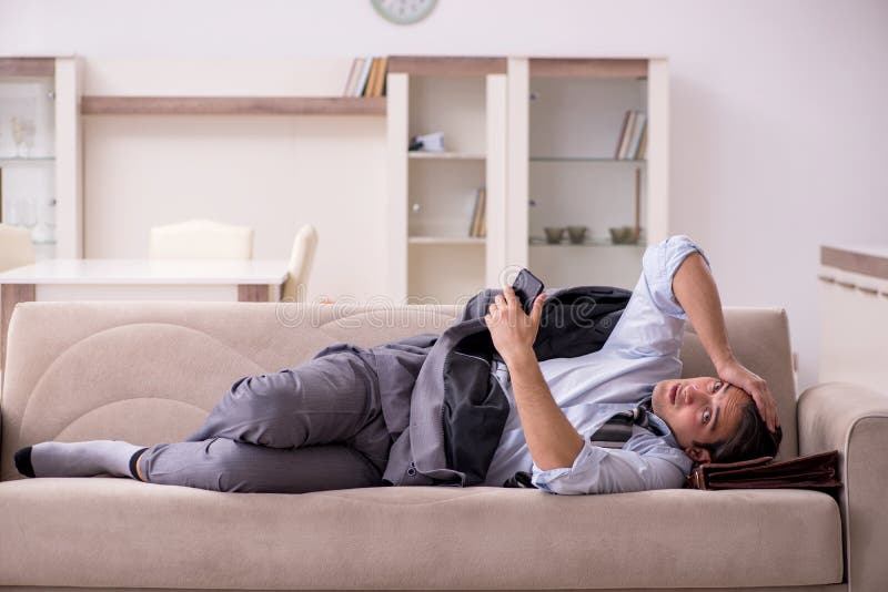 Tired Young Businessman Coming Home after Working Day Stock Image ...