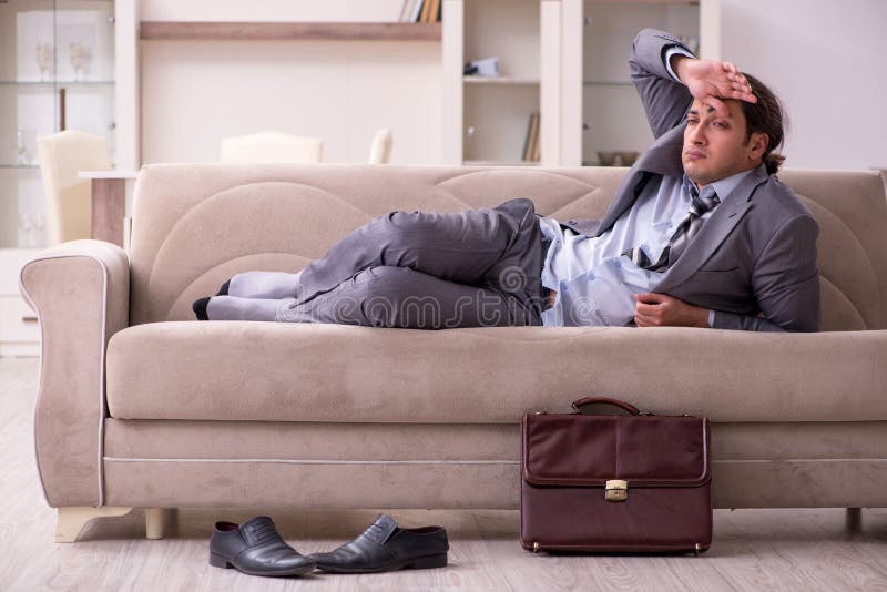 Tired Young Businessman Coming Home after Working Day Stock Photo ...