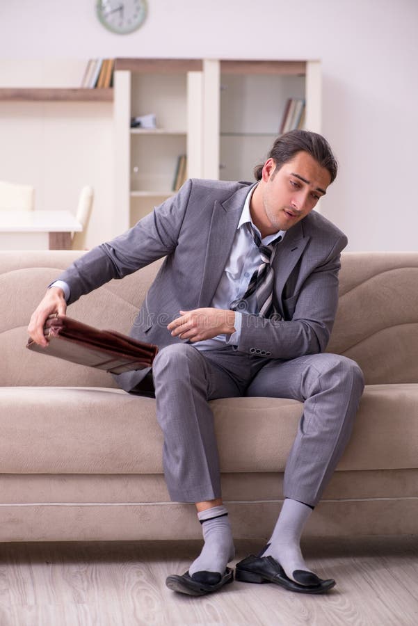 Tired Young Businessman Coming Home after Working Day Stock Photo ...