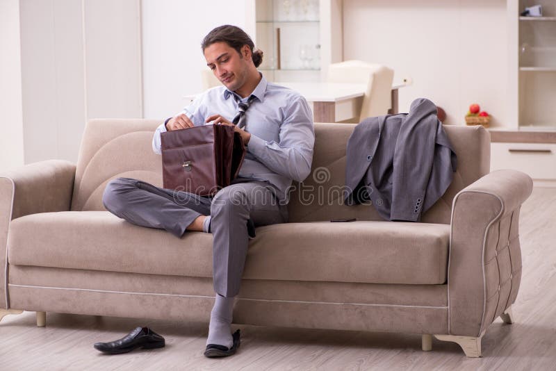Businessman coming home. stock photo. Image of house, open - 2284510