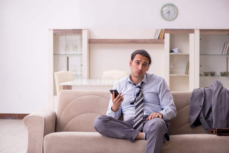 Tired Young Businessman Coming Home after Working Day Stock Image ...