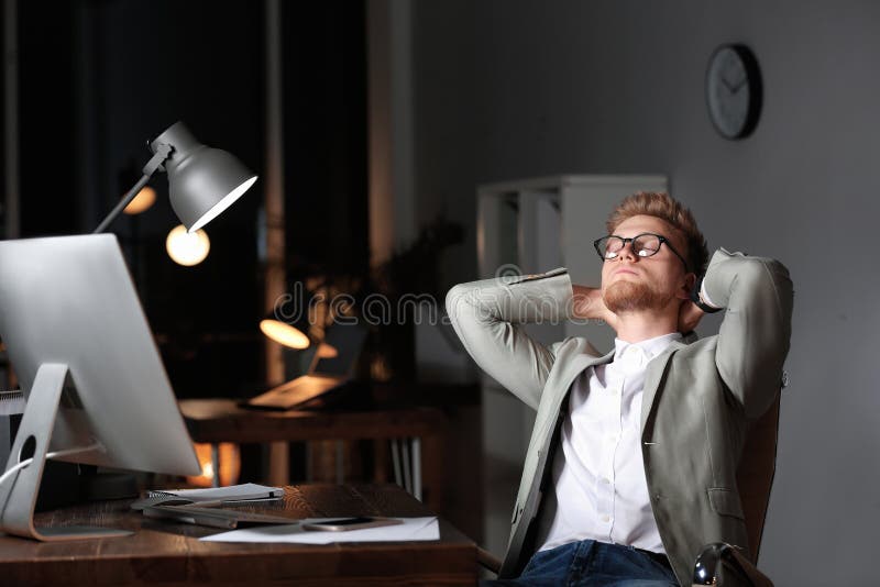 Tired Young Businessman Working in Office Alone Stock Image - Image of ...