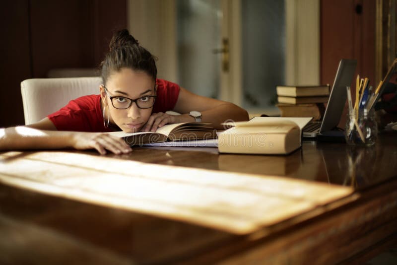 Tired Young Female Doing Homework at Home Stock Image - Image of ...