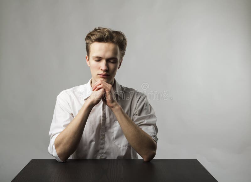 Tired Young Man is Praying. Prayer and Fatigue Concept Stock Image ...