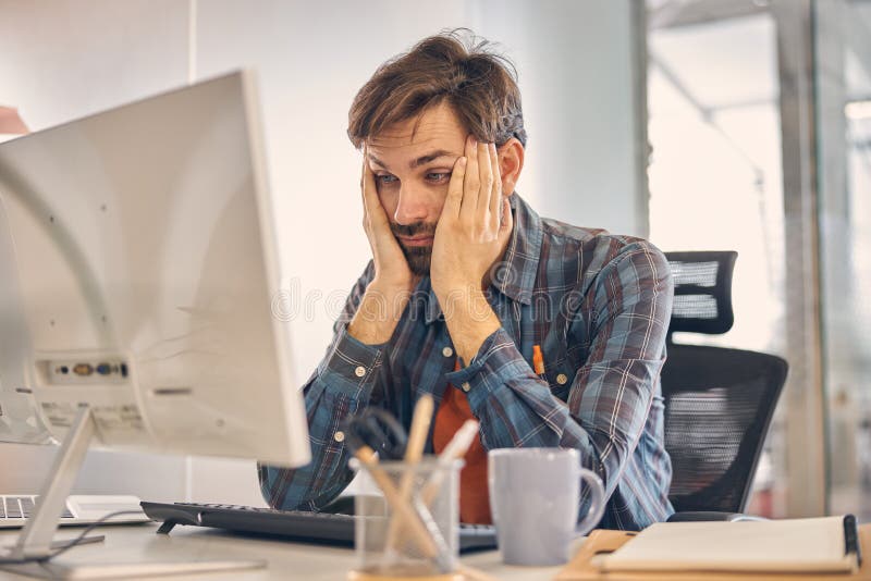Exhausted Male Worker Using Computer in Office Stock Image - Image of ...