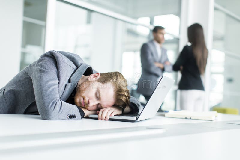 Tired Young Man Sleeping in the Office Stock Image - Image of sleeping ...