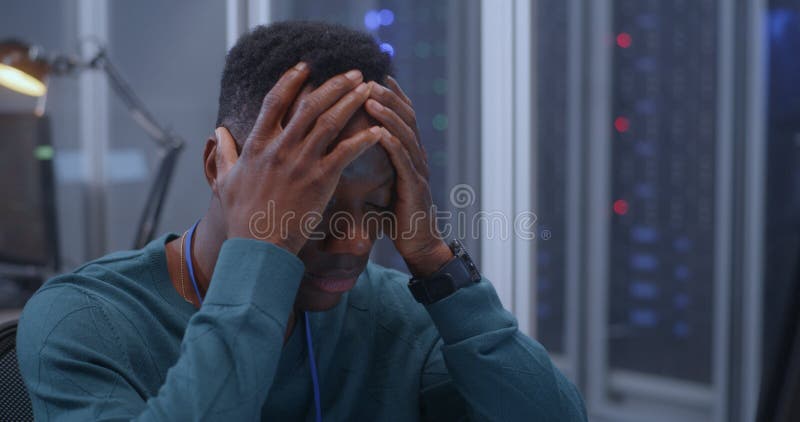 Tired Young Man Working in Data Center Stock Image - Image of ...