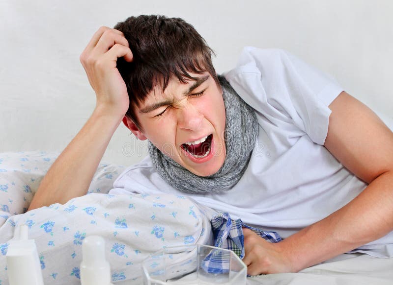 Tired Young Man Yawning stock image. Image of indoor - 85192847