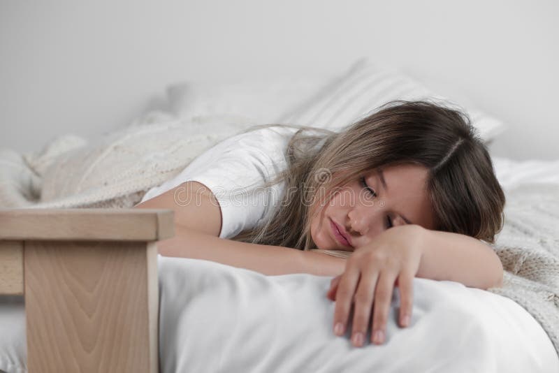 Tired Young Woman Sleeping in Bed Indoors Stock Image - Image of girl ...