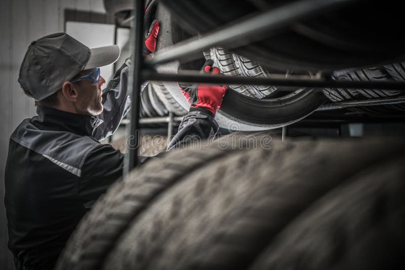 Tires Store Worker stock photo. Image of technician - 137539028
