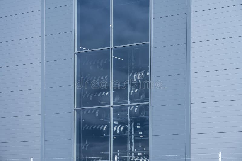 Tires Visible through a Window at a Large Warehouse.. Stock Photo ...
