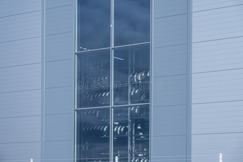 Tires Visible through a Window at a Large Warehouse.. Stock Photo ...