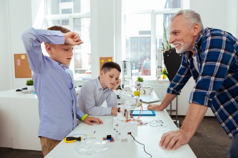 Nice Tired Boy Touching His Forehead Stock Photo - Image of experience ...