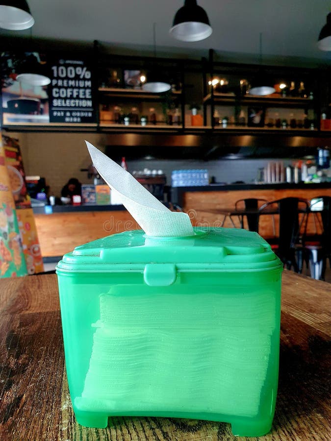 Tissue box in a cafe stock photo. Image of green, tissue - 265307270