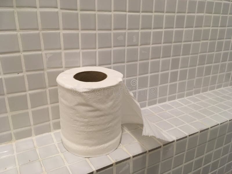 Tissue Paper Roll on Tiled Wall Background Stock Photo - Image of ...