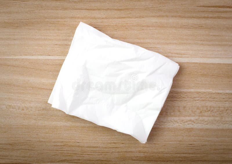 Tissue on the Wooden Table stock photo. Image of canvas - 149436974