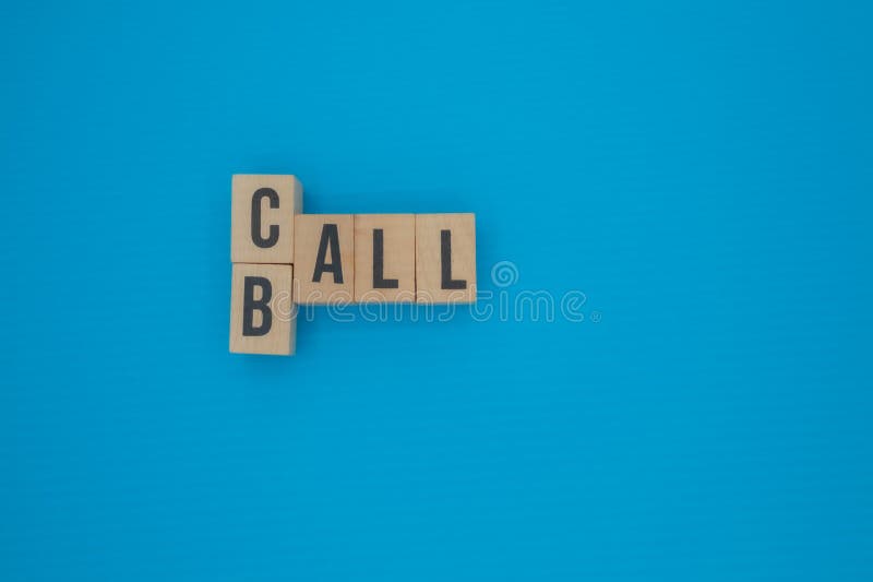 Title: Words CALL and BALL in Wooden Blocks on Bright Blue Background ...