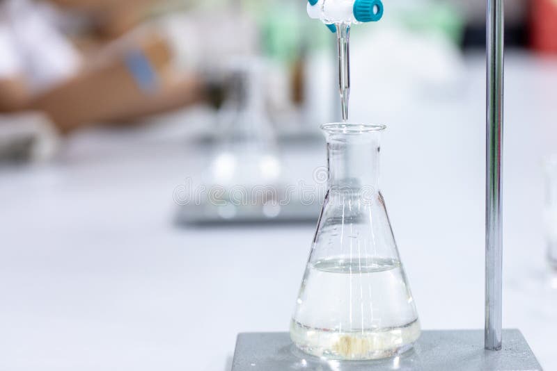 Titration Technique in the Laboratory. Stock Image - Image of hand ...