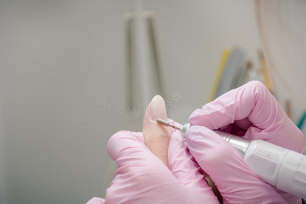 To Cut Nails the Machine. Processing of Nails the Machine in Beauty ...