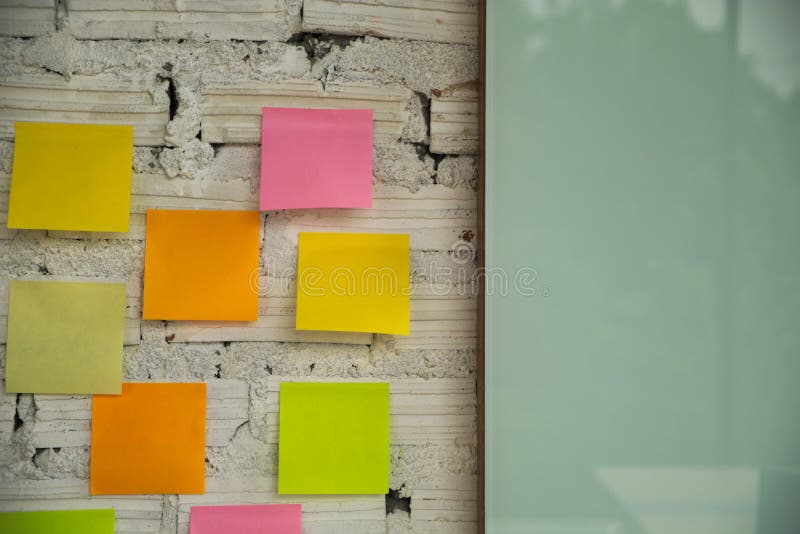 A To Do List with Colorful Note Papers on Glass Wall Stock Photo ...
