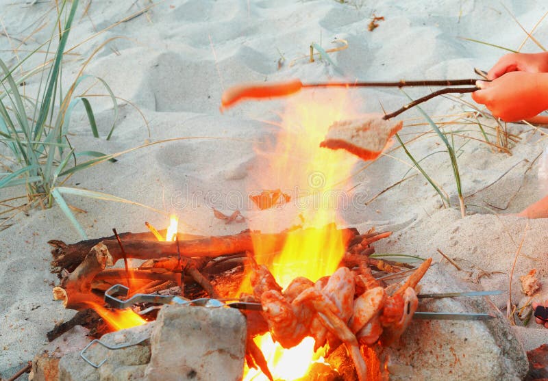 To Fry Bread on a Grill, To Warm Slices of Bread on a Fire Stock Photo ...