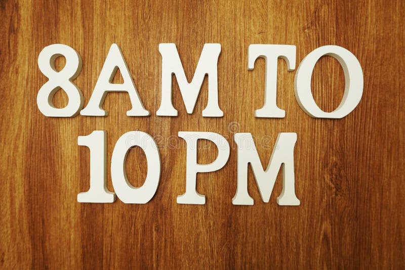 8 AM To 10 PM On Wooden Background Stock Image - Image of enter ...
