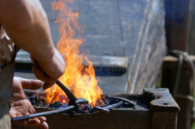 To Strike while the Iron is Hot Stock Photo - Image of strength, anvil ...