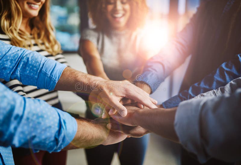 In it To Win it. a Group of Creative Businesspeople Standing with Their ...