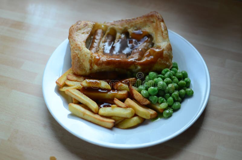 Toad in the Hole or Sausage Toad is a Traditional English Dish Stock ...
