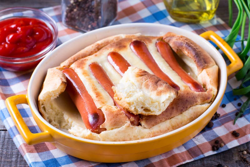 Toad in the Hole - Traditional Sausage and Pudding Batter Bake Stock ...