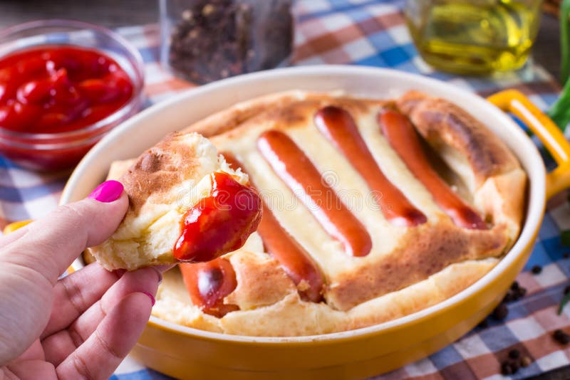 Toad in the Hole - Traditional Sausage and Pudding Batter Bake Stock ...