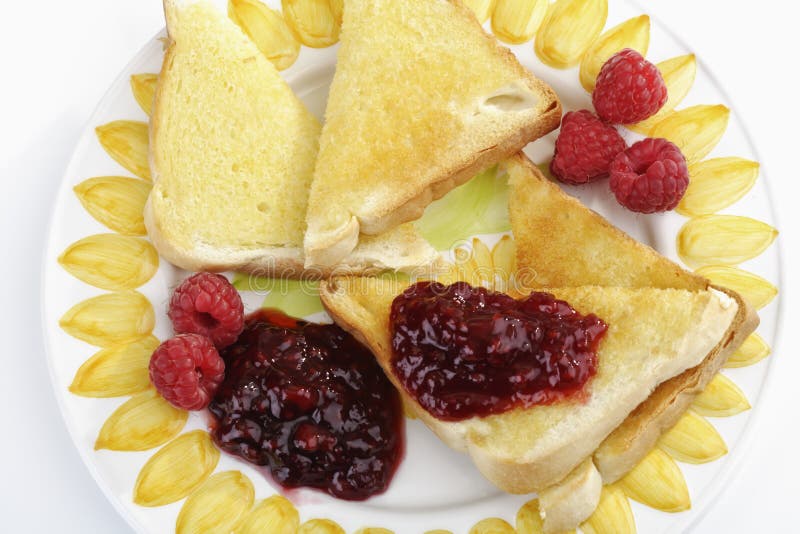 Toast Bread with Butter and Raspberry Jam on Plate Stock Photo - Image ...