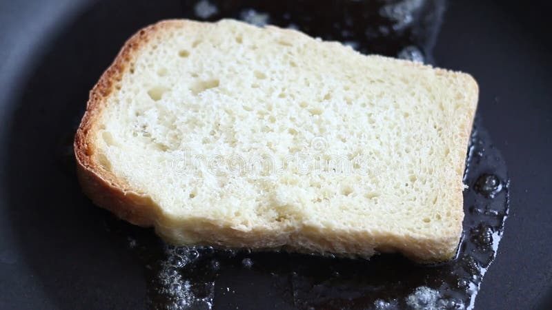 Toast bread frying stage stock video. Video of bread - 84998405