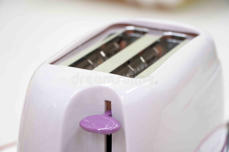 Toast Bread in Pink Toaster,isolated on White Background Stock Image ...