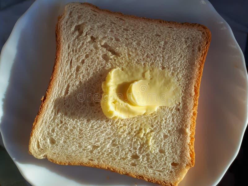 Toast with butter stock image. Image of shadow, yellow - 173201719
