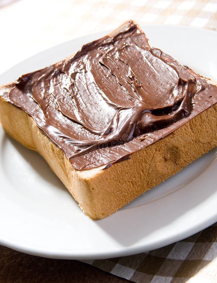 Toast with chocolate sauce stock image. Image of muesli - 8865079