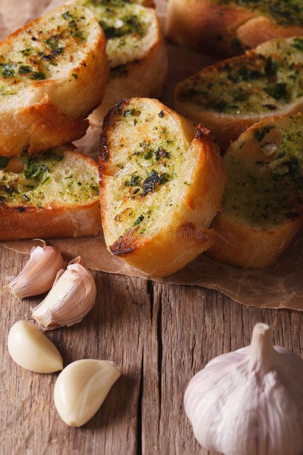 Toast with Fresh Herbs and Garlic Closeup. Vertical Stock Image - Image ...