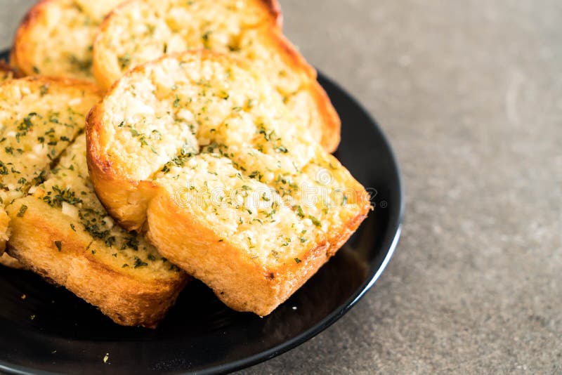 Garlic bread on plate stock photo. Image of slice, isolated - 105033070