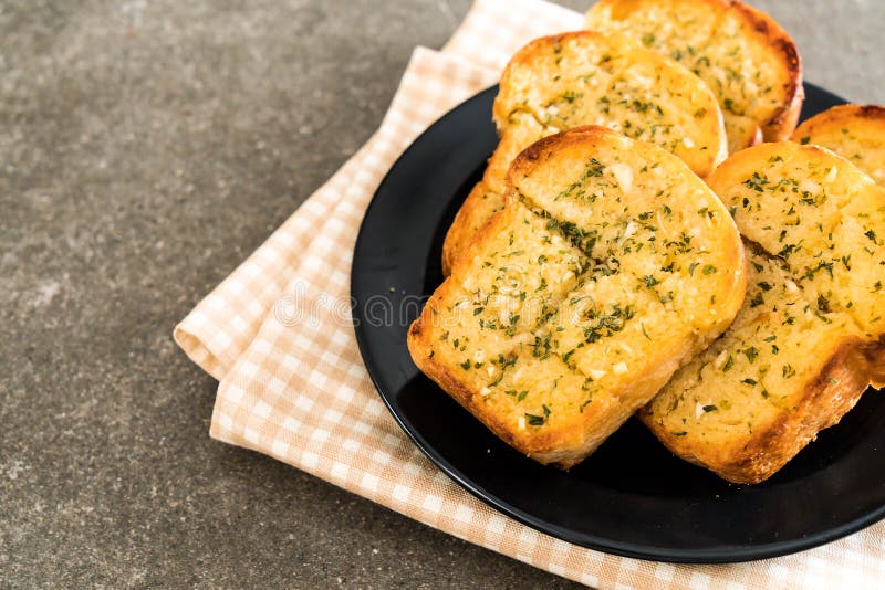 Garlic bread on plate stock image. Image of baked, vegetarian - 105033611