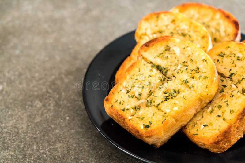 Garlic bread on plate stock photo. Image of appetizer - 108134658