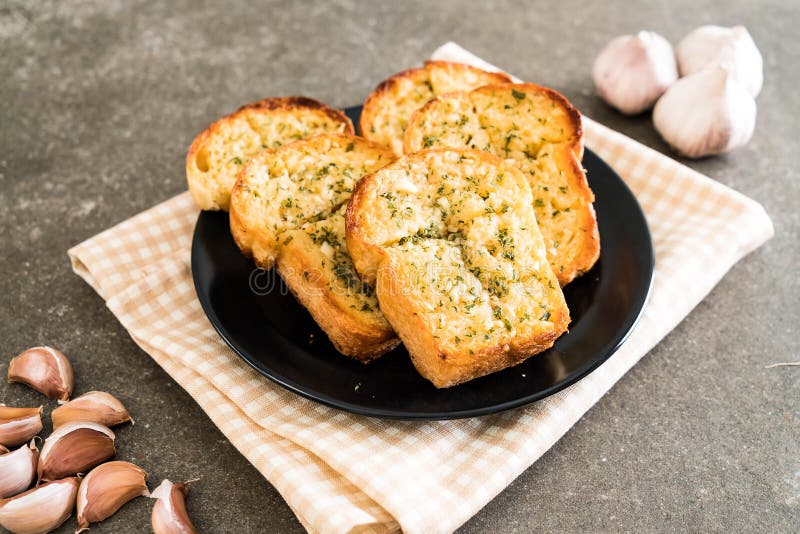 Garlic bread on plate stock photo. Image of toast, rustic - 108134730