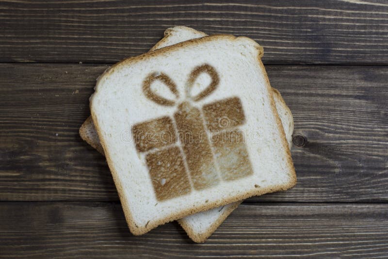 Toast with a Gift Sign on Dark Wood Stock Photo - Image of grilled ...