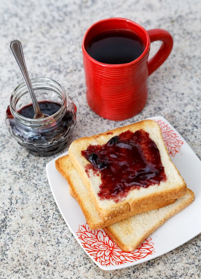 Toast with jam and a cup stock photo. Image of homemade - 56989678
