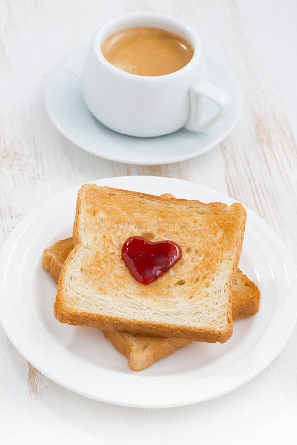 Toast with Jam in the Shape of a Heart and Coffee, Vertical Stock Photo ...
