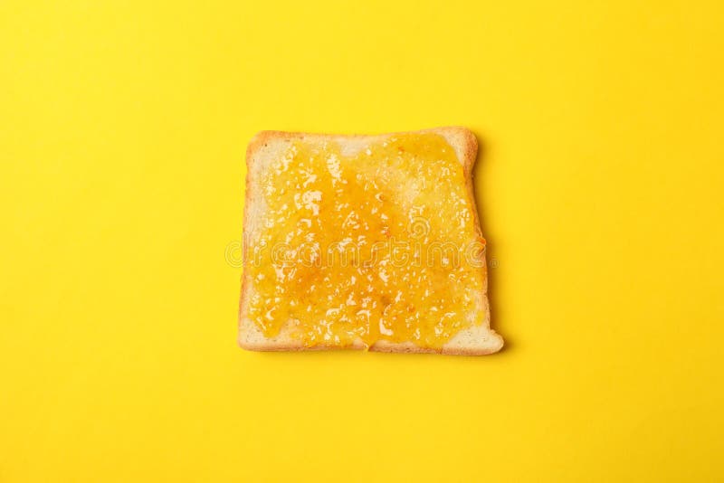 Toast with Orange Jam on Yellow Background Close Up Stock Image - Image ...